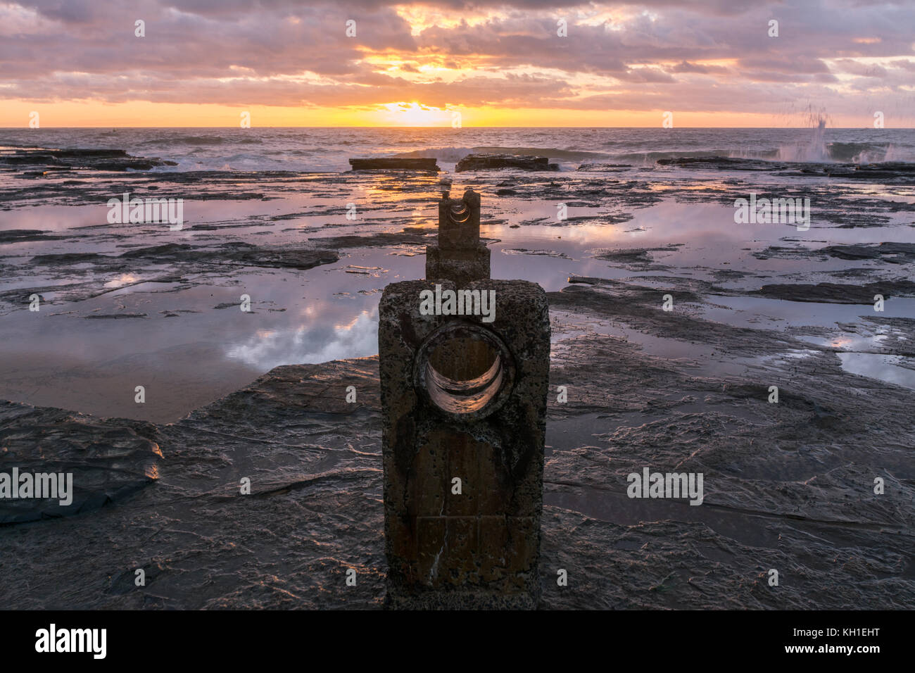 Rock pools at sunset Stock Photo - Alamy