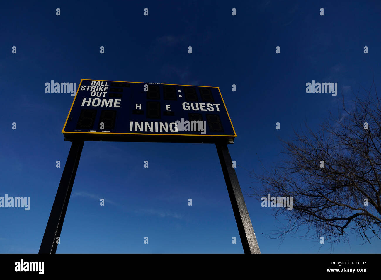 Home Guest Sign against the intense blue sky Stock Photo - Alamy