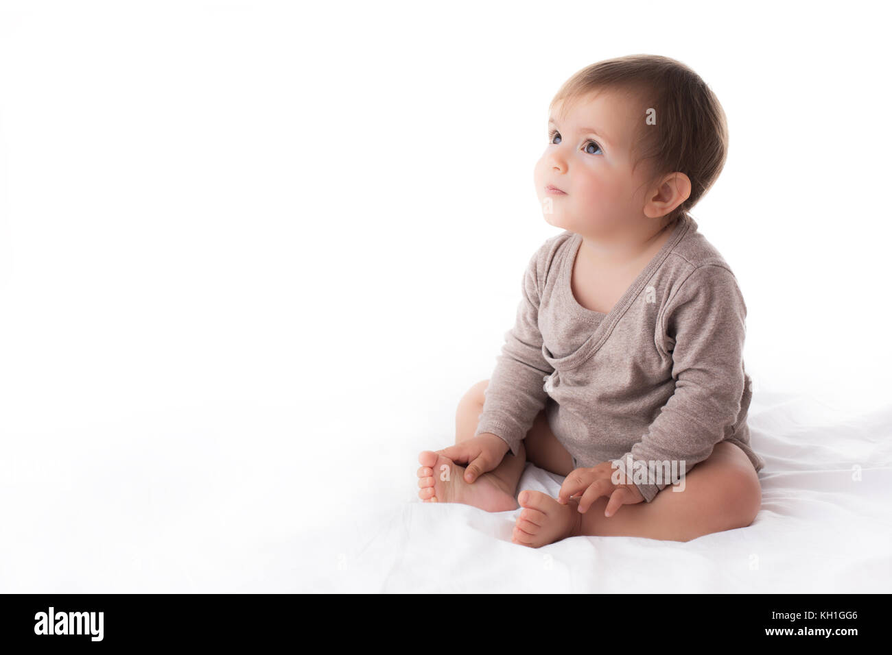 Portrait of a baby girl on a white background Stock Photo - Alamy