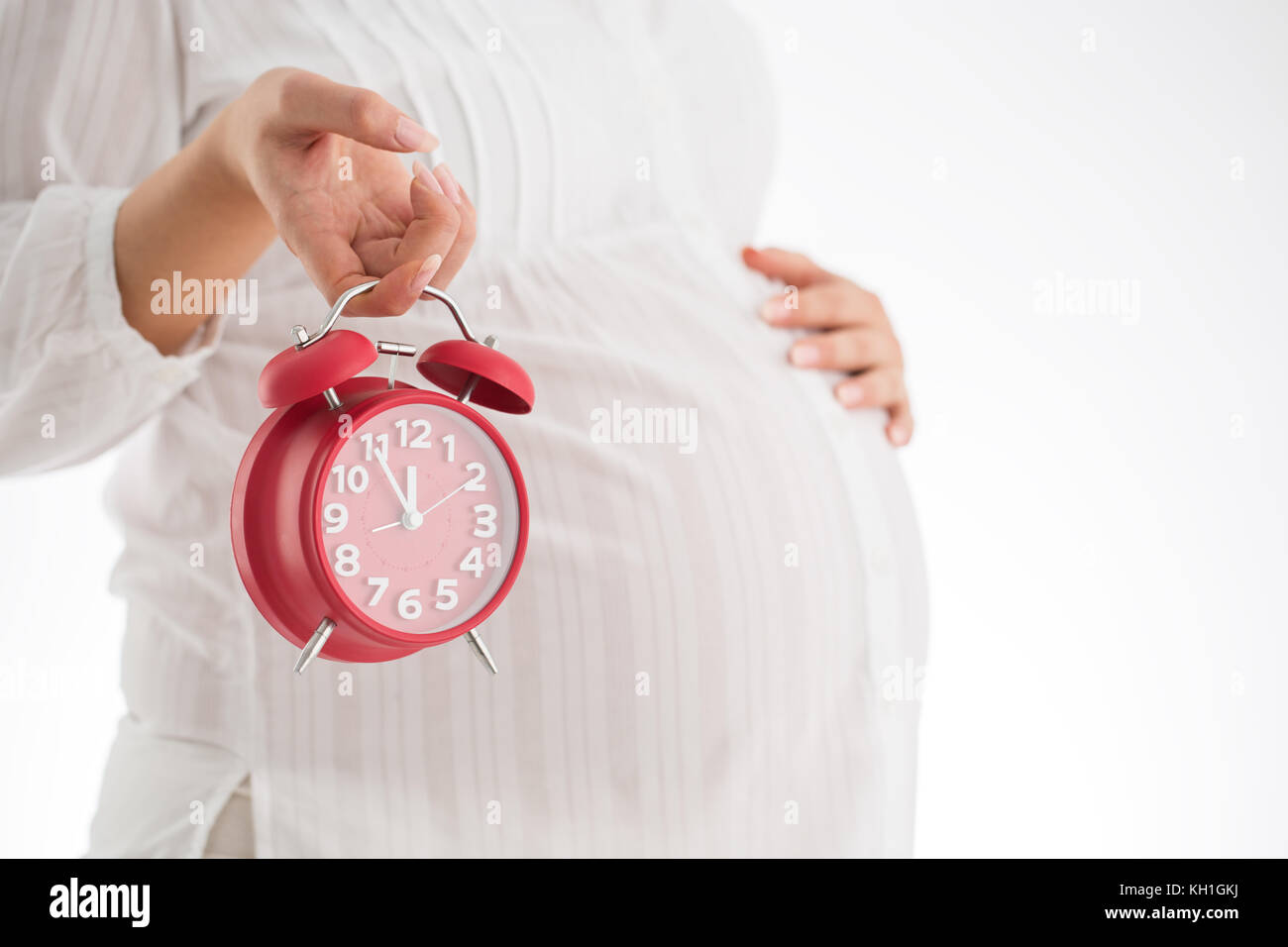 Counting hours expecting child birth. Motherhood concept. Pregnant ...