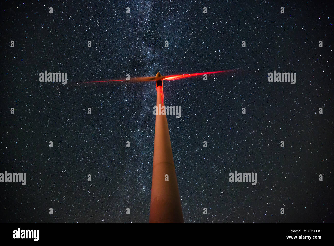Wind turbines on the starry night sky with milkyway Stock Photo - Alamy