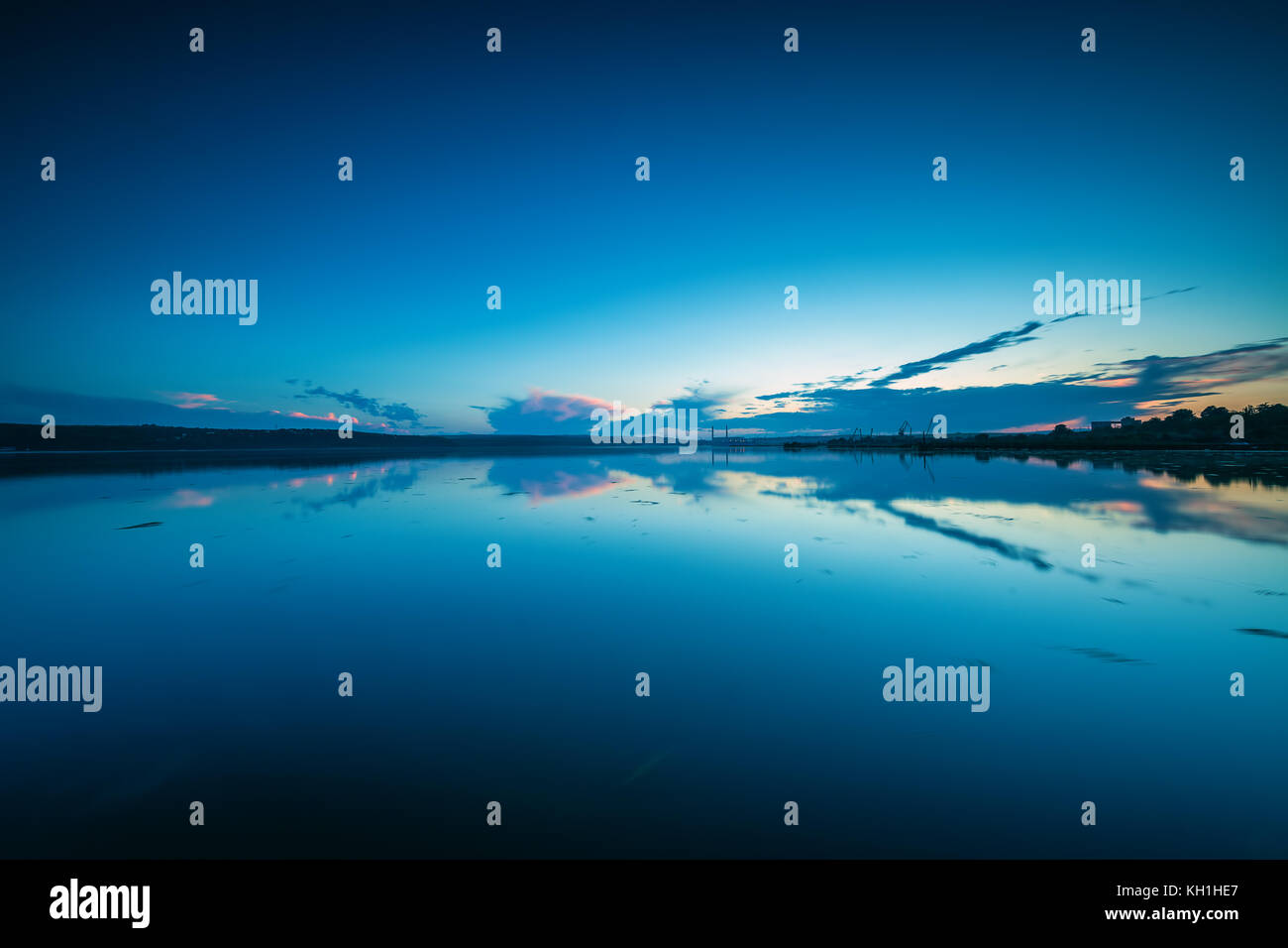 Beautiful cloudscape over the lake, sunset shot Stock Photo - Alamy
