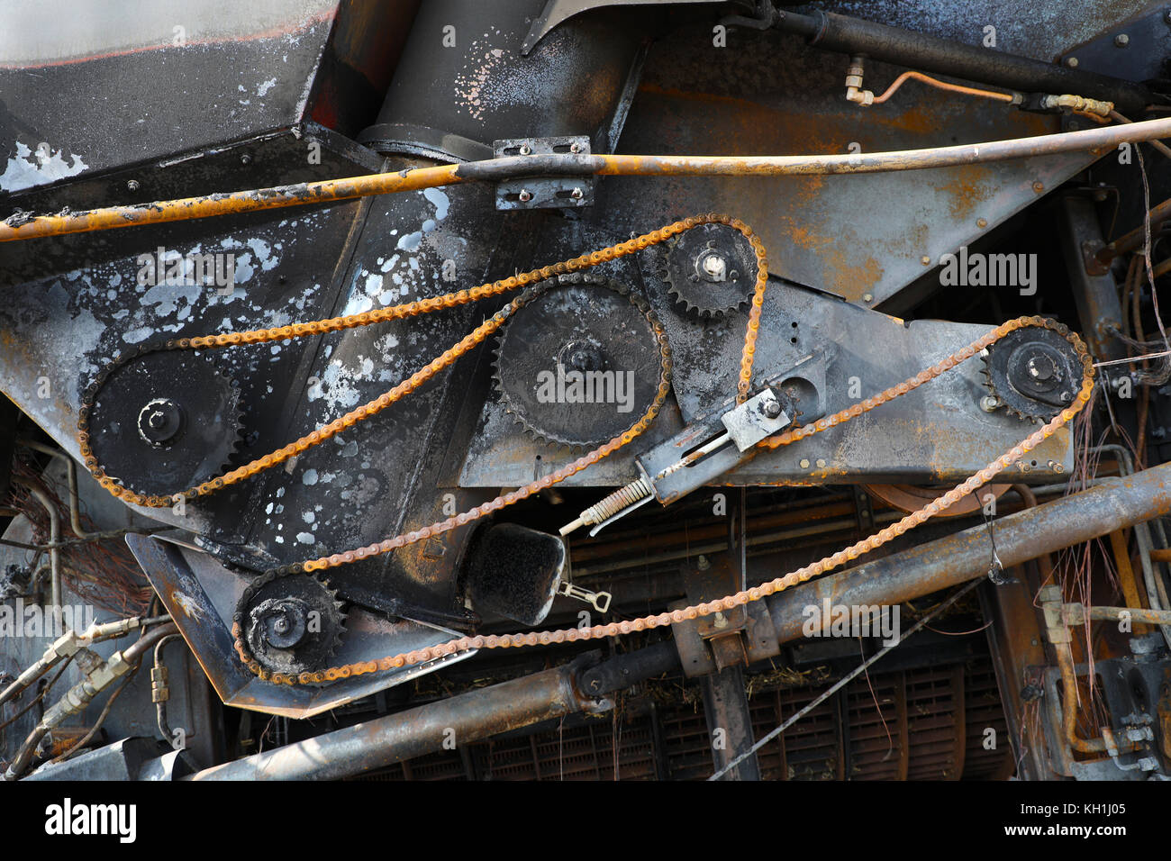 Detail of a burnt out combine harvester Stock Photo - Alamy