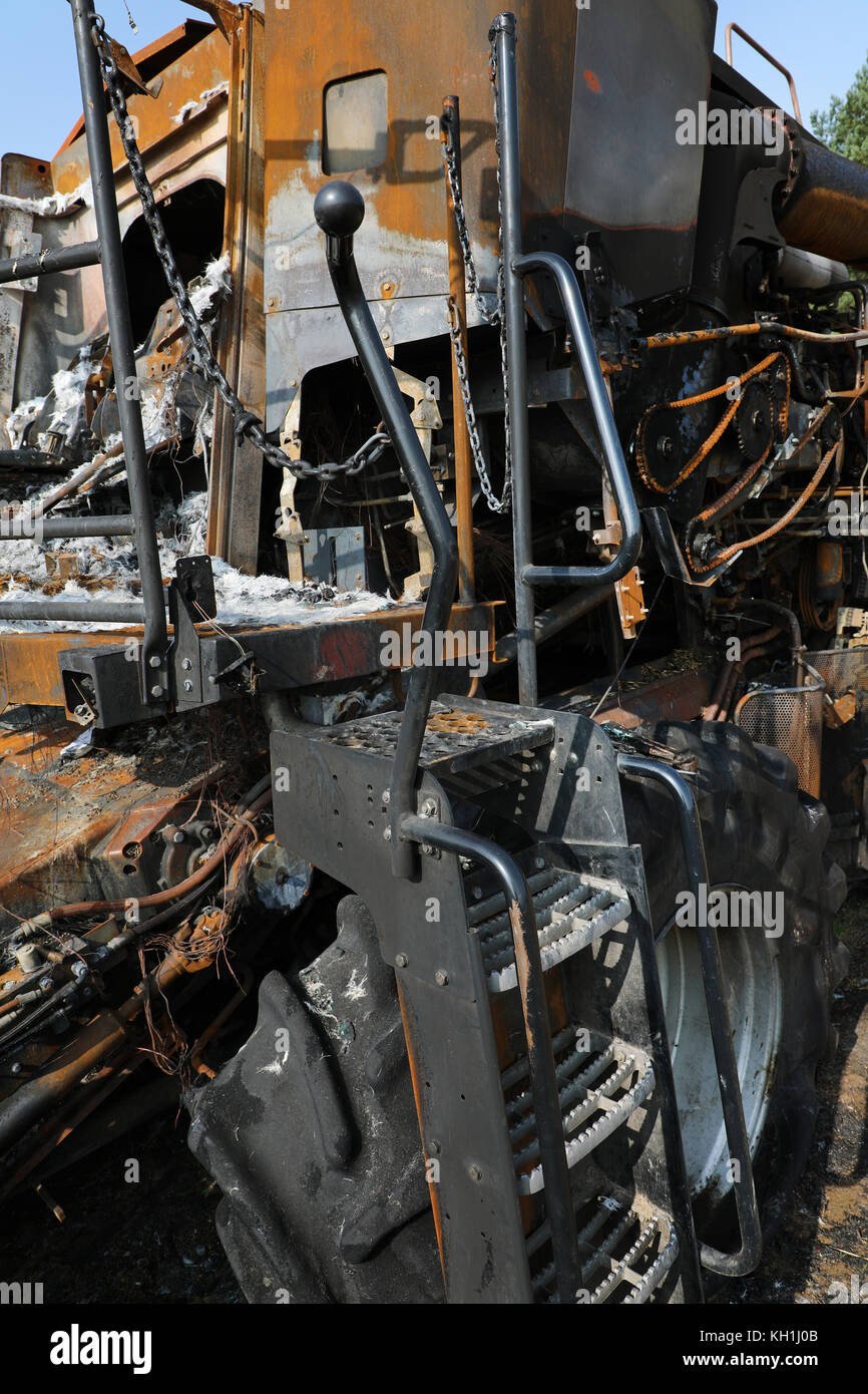Destroyed Fire Combine Harvester High Resolution Stock Photography and ...