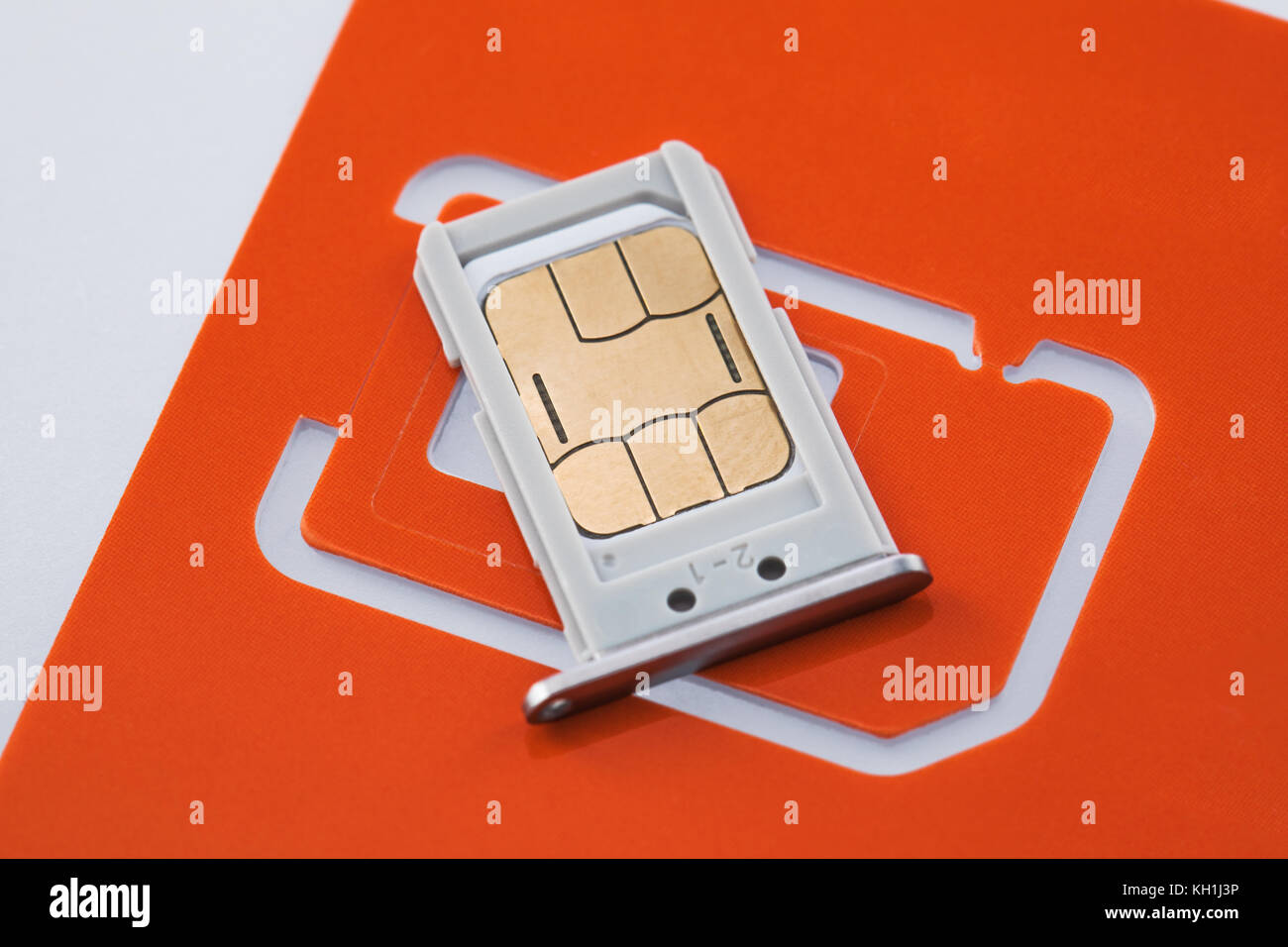 Nano sim card with sim tray and sim card adapter on white background ...