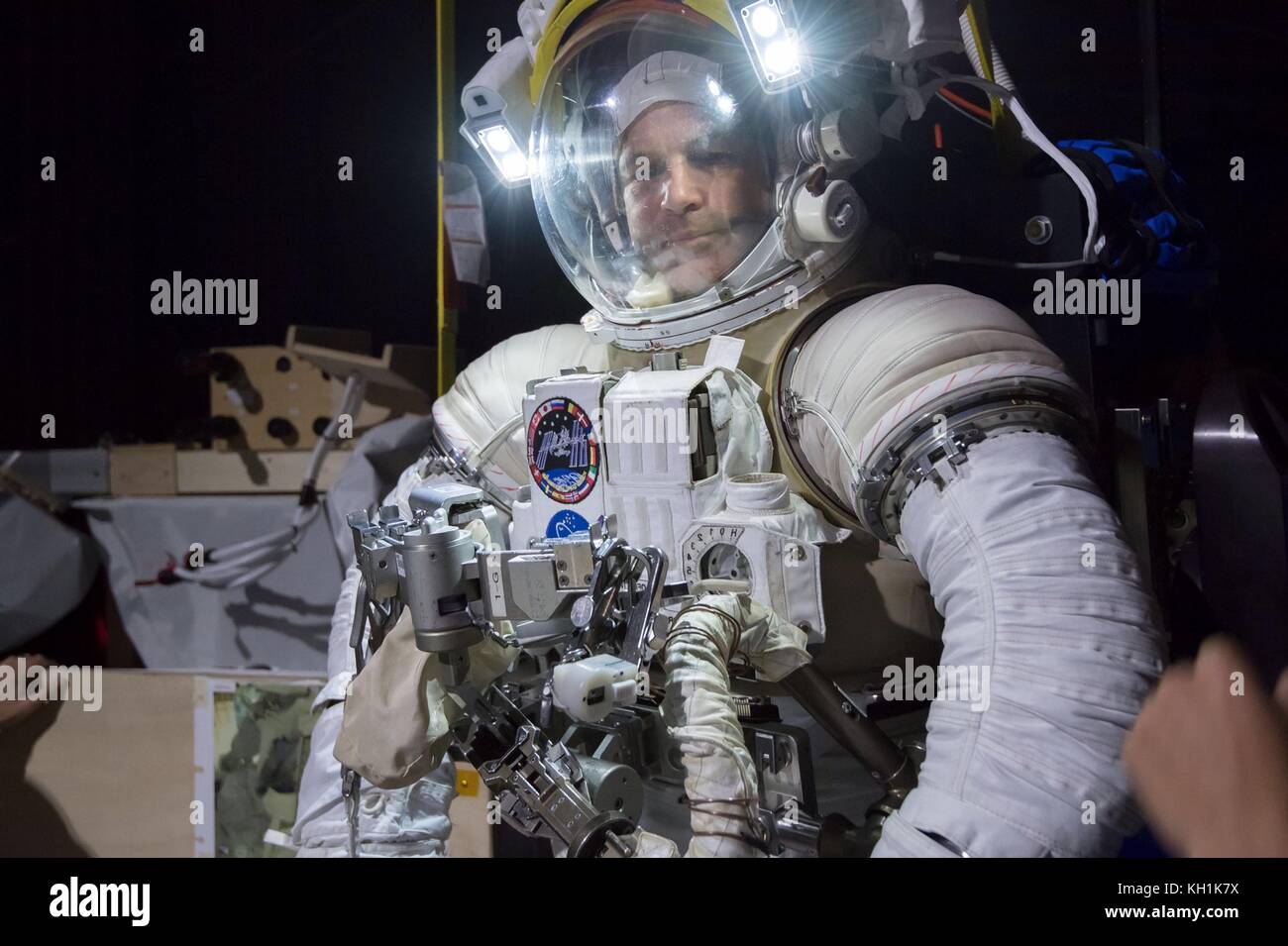 Canadian Space Agency astronaut Jeremy Hansen is suspended over a mock ...