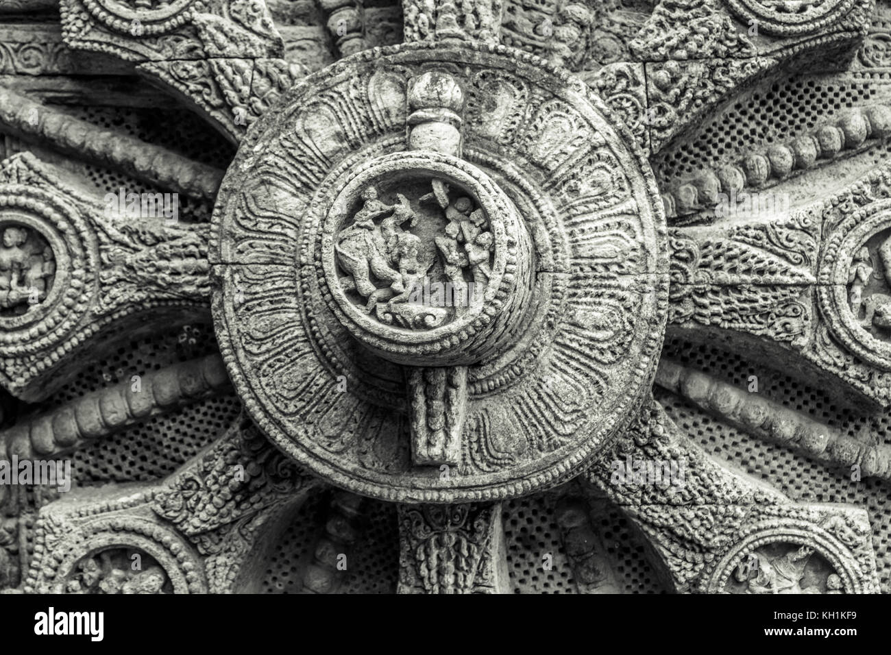 Close up of Intricate carvings on a stone wheel in the ancient Hindu ...