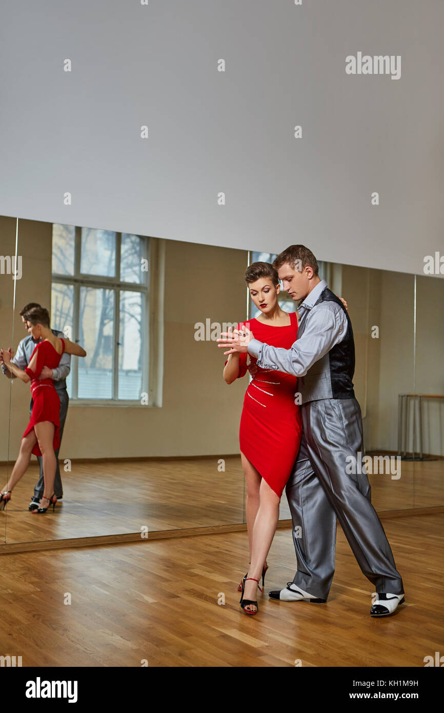 beautiful couple dancing tango Stock Photo - Alamy
