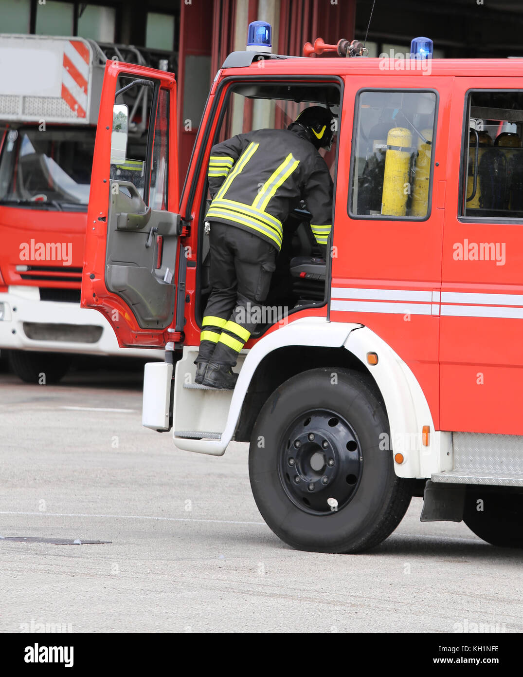 brave firefighters and their fire truck during a rescue mission Stock ...