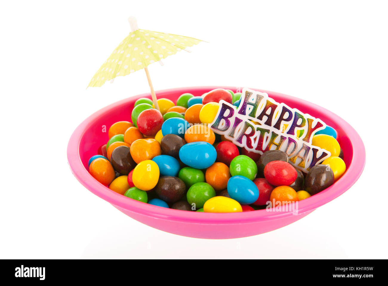 Colorful party candy in cups isolated over white background Stock Photo ...