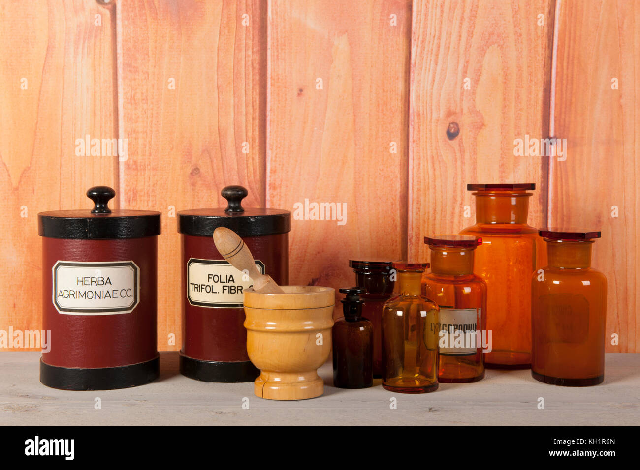 Several pharmacy objects in interior with wooden background Stock Photo ...