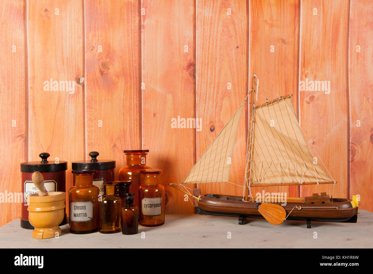 Several pharmacy objects in interior with wooden background Stock Photo ...