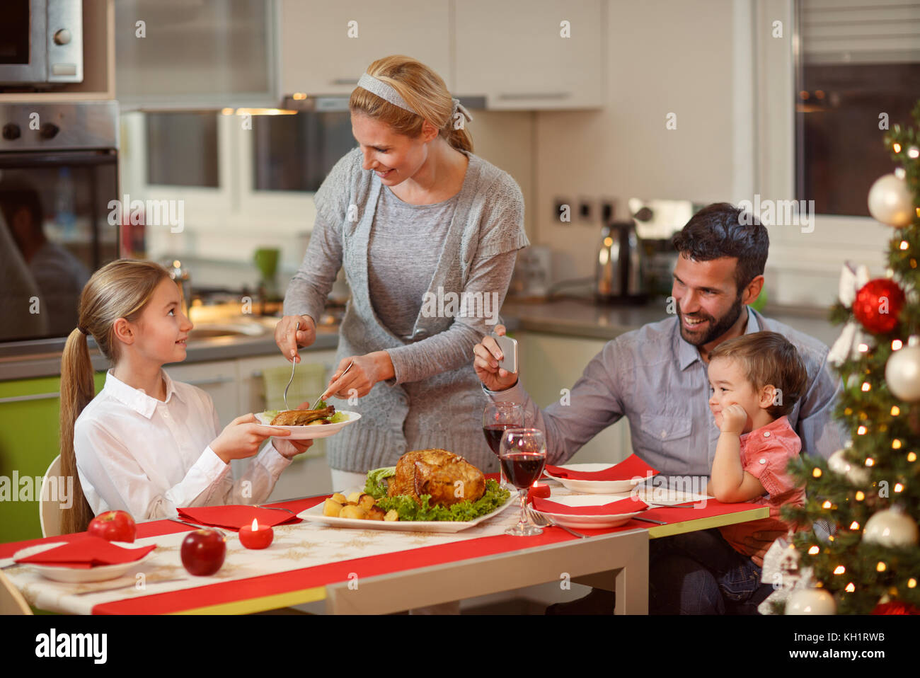 Family together Christmas celebration concept Stock Photo - Alamy
