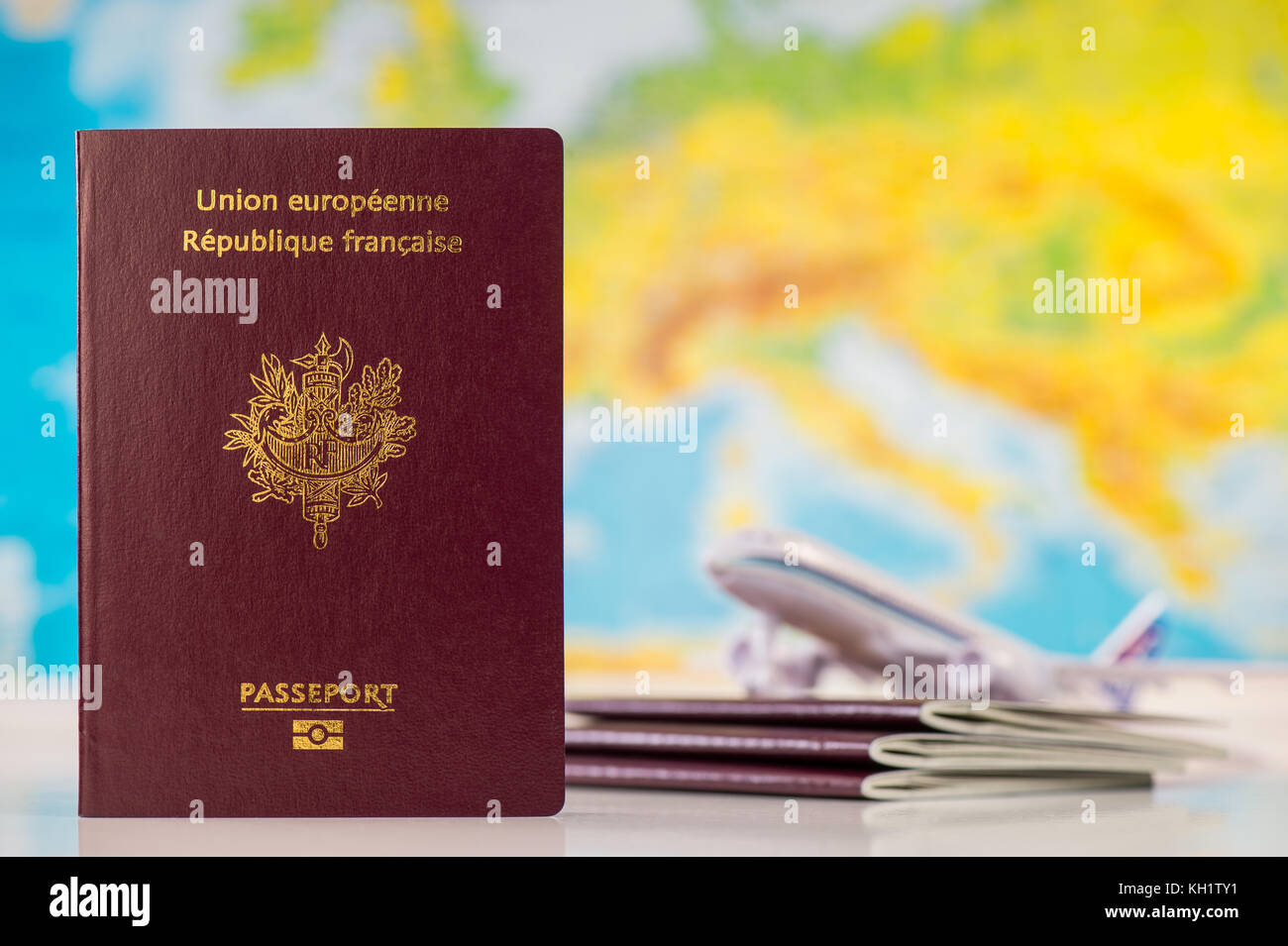 French passport on map and plane background, France Stock Photo - Alamy