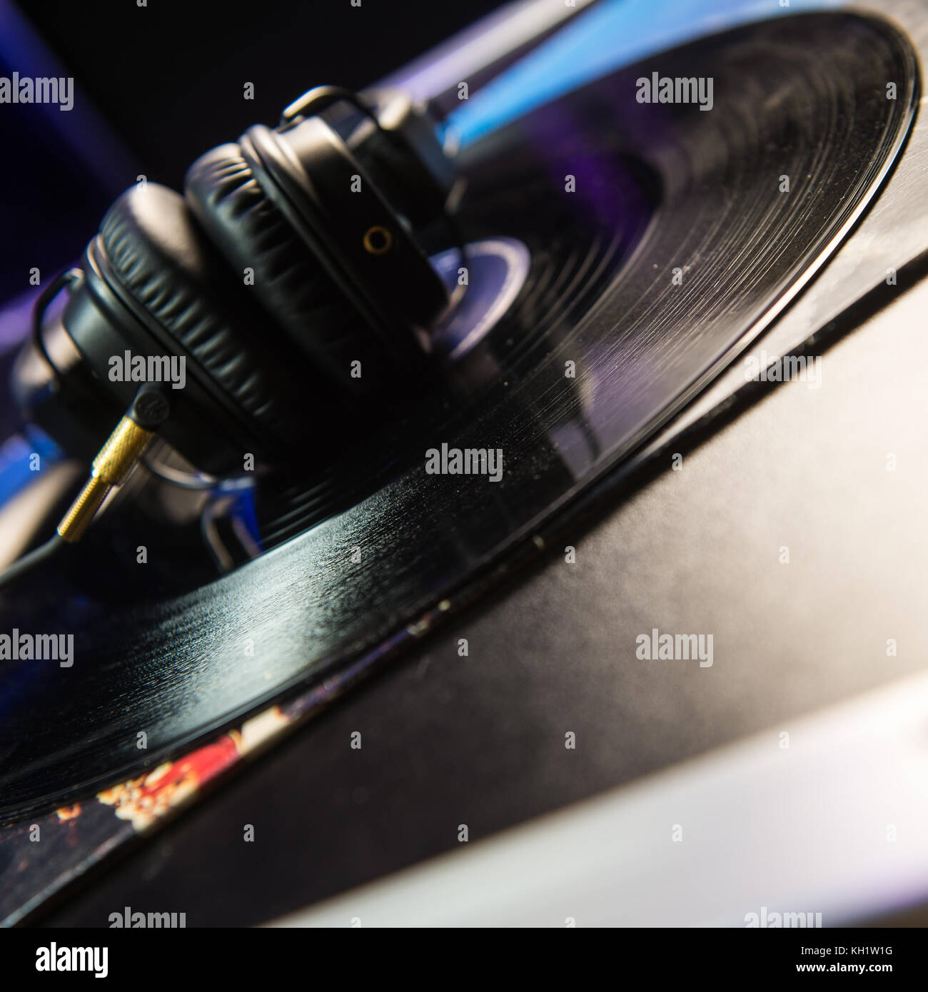 Vinyl record and headphone over table, France Stock Photo - Alamy