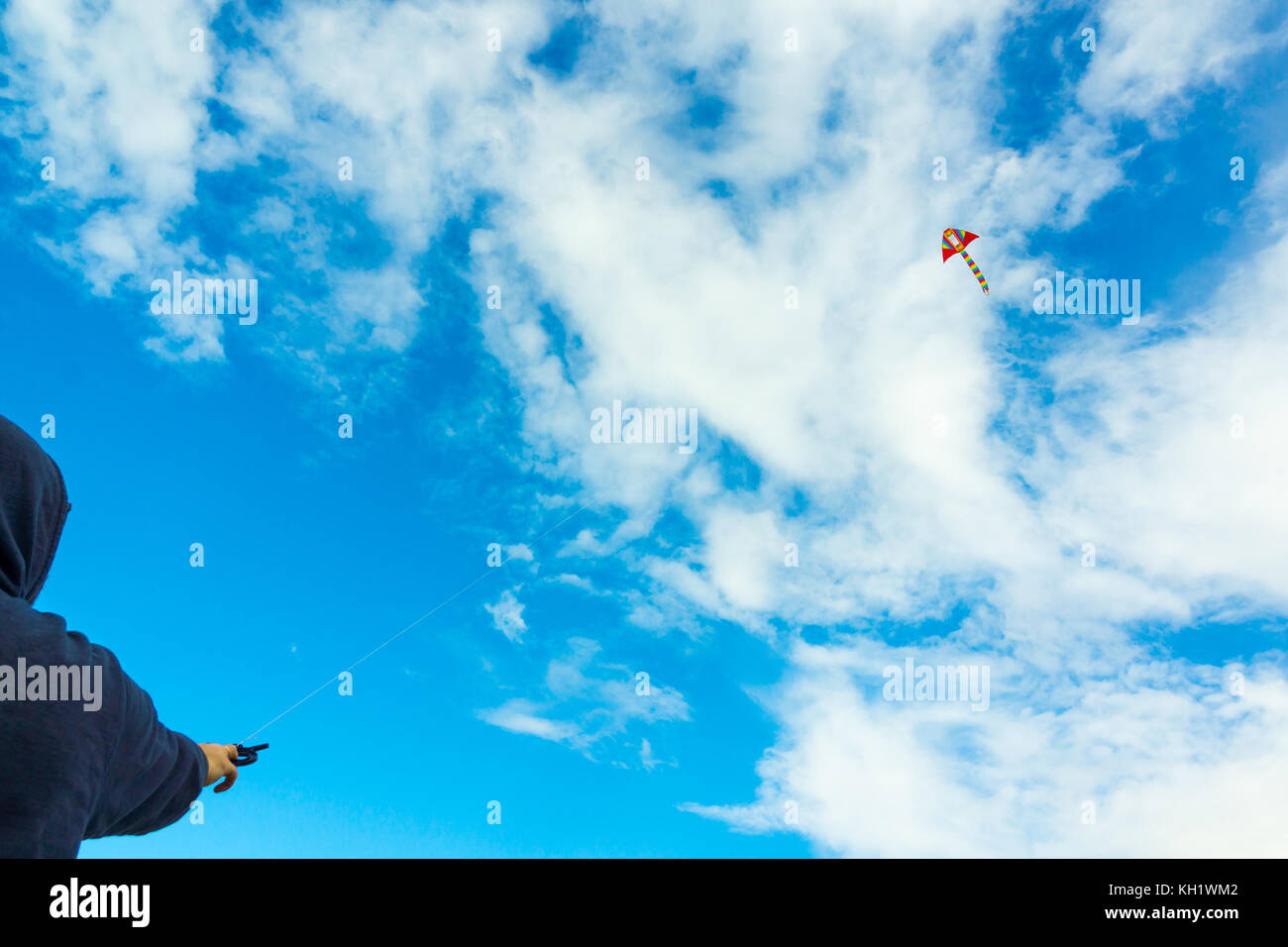 Hands holding kite Stock Photo - Alamy