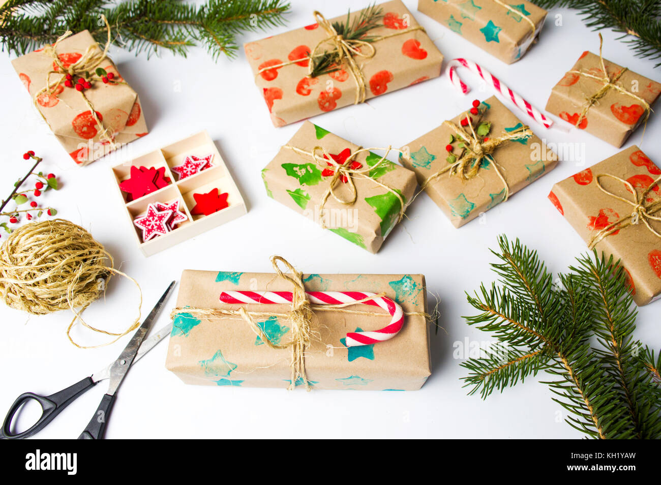 Festive packed presents boxes on a table top view Stock Photo - Alamy