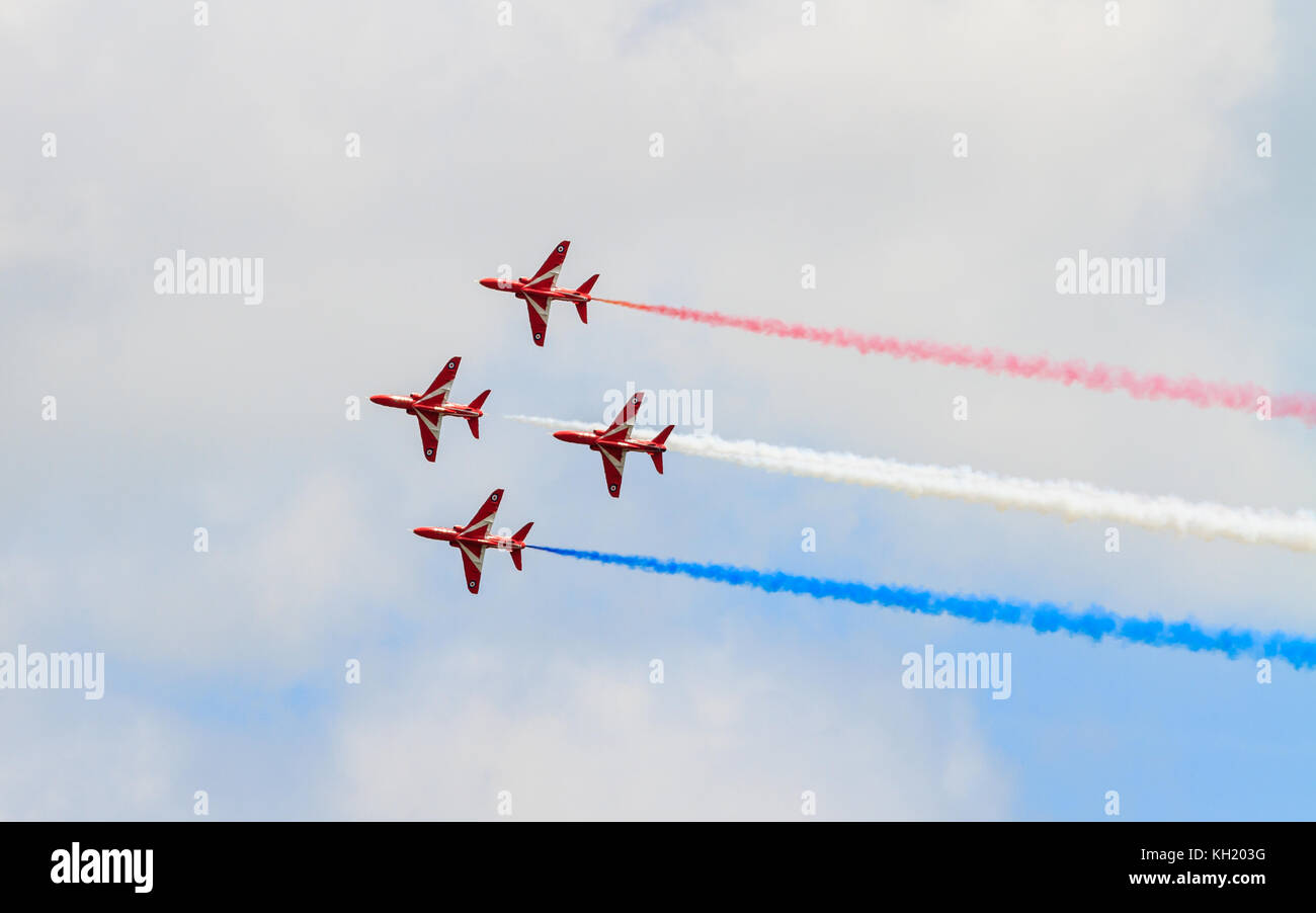 RAF aerobatics display team the Red Arrows give a display Stock Photo ...