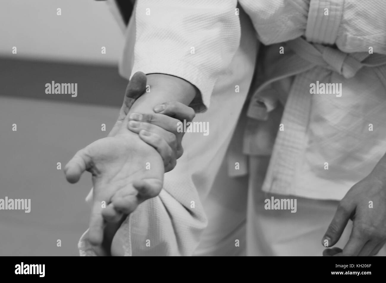 combat arm in sparring on the tatami Stock Photo - Alamy