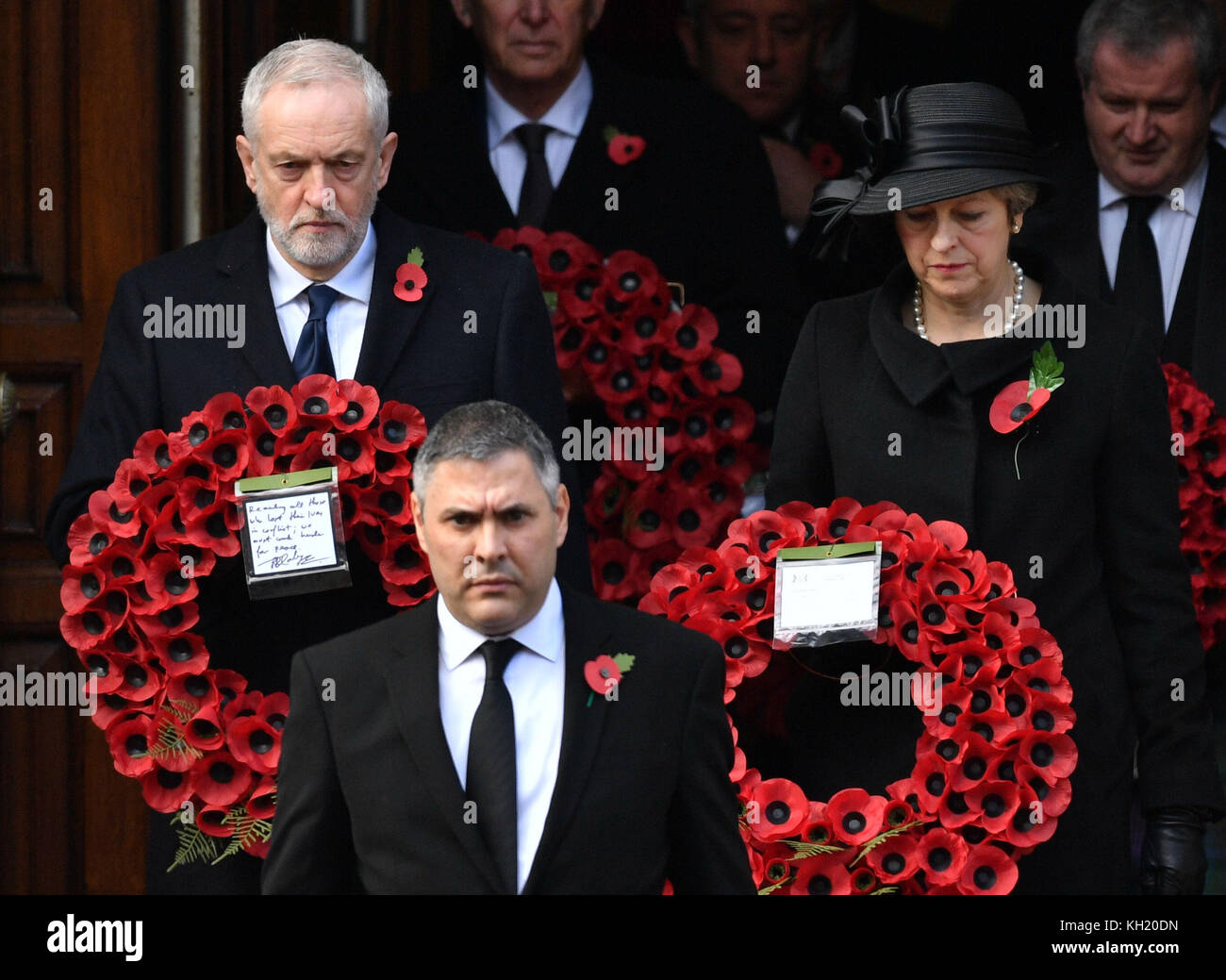 Labour leader Jeremy Corbyn walks with Prime Minister Theresa May, as ...
