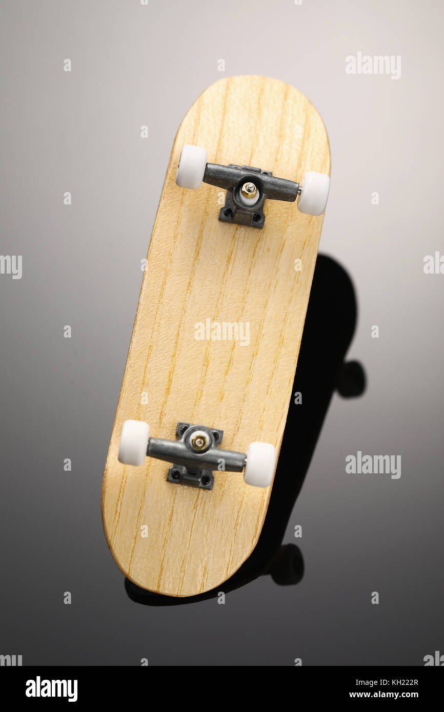 Fingerboard on a gradient background, closeup Stock Photo - Alamy