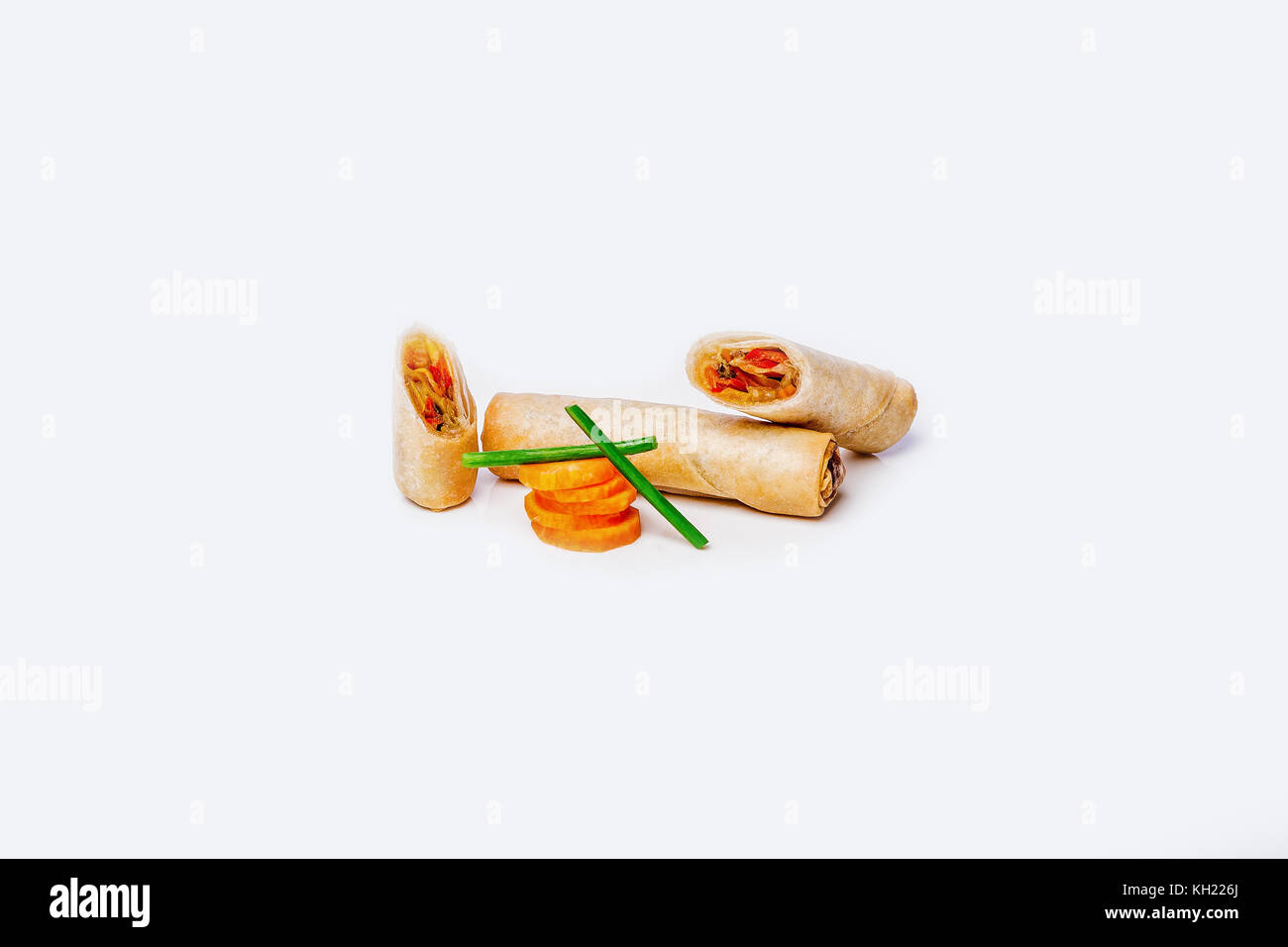Spring-rolls with vegetables on a white background Stock Photo - Alamy