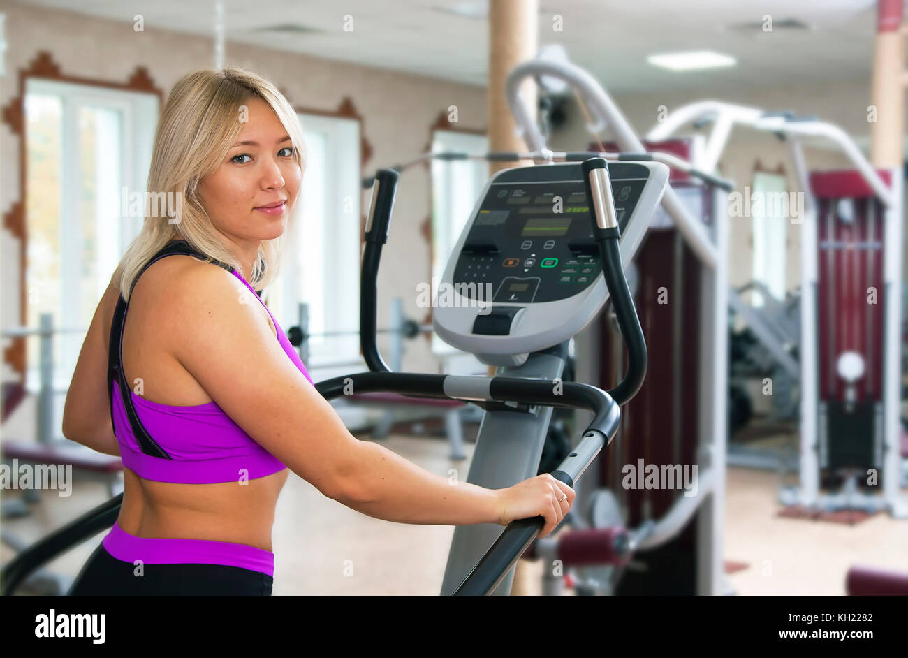 Girl on treadmill hi-res stock photography and images - Alamy