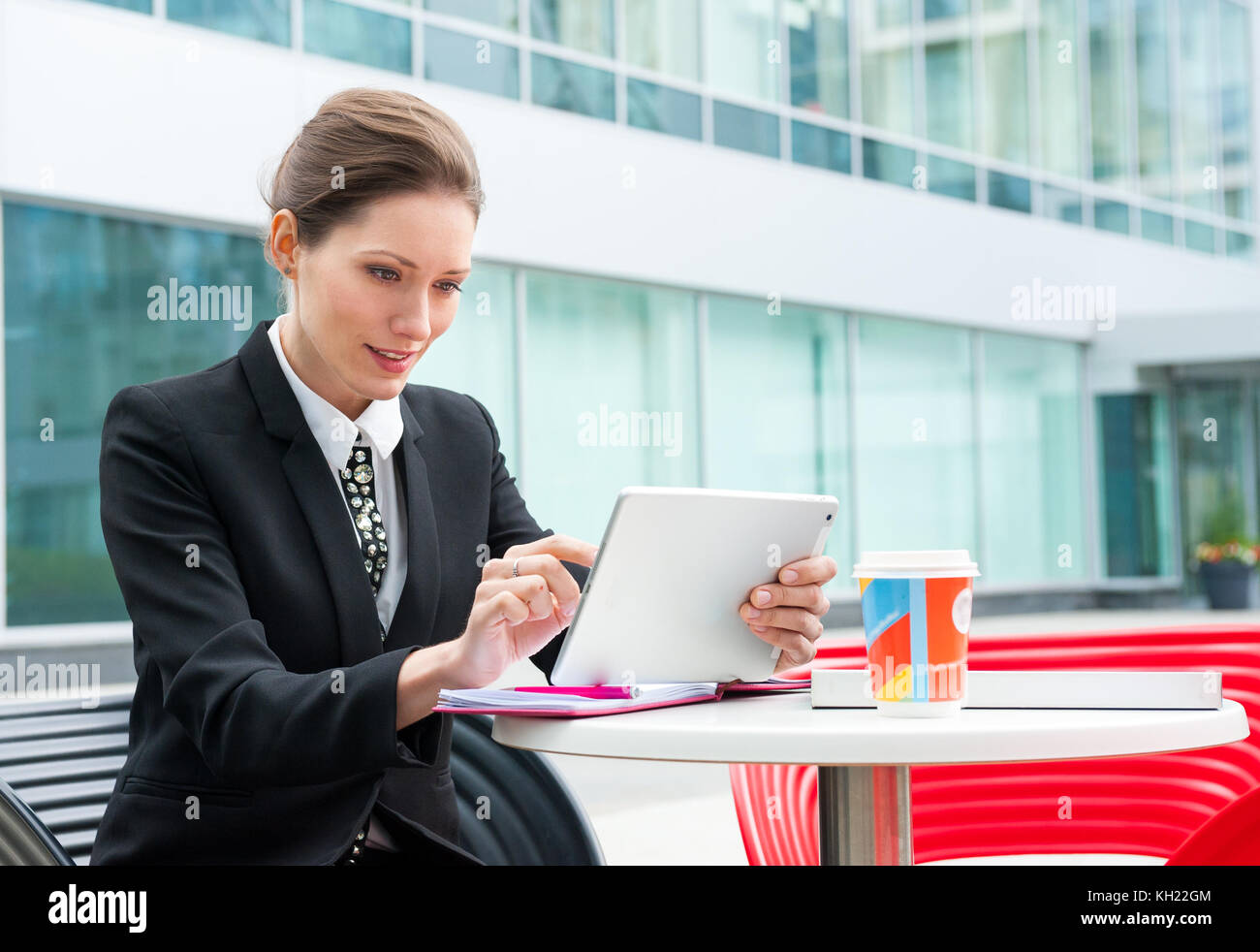 Young business woman working Stock Photo - Alamy