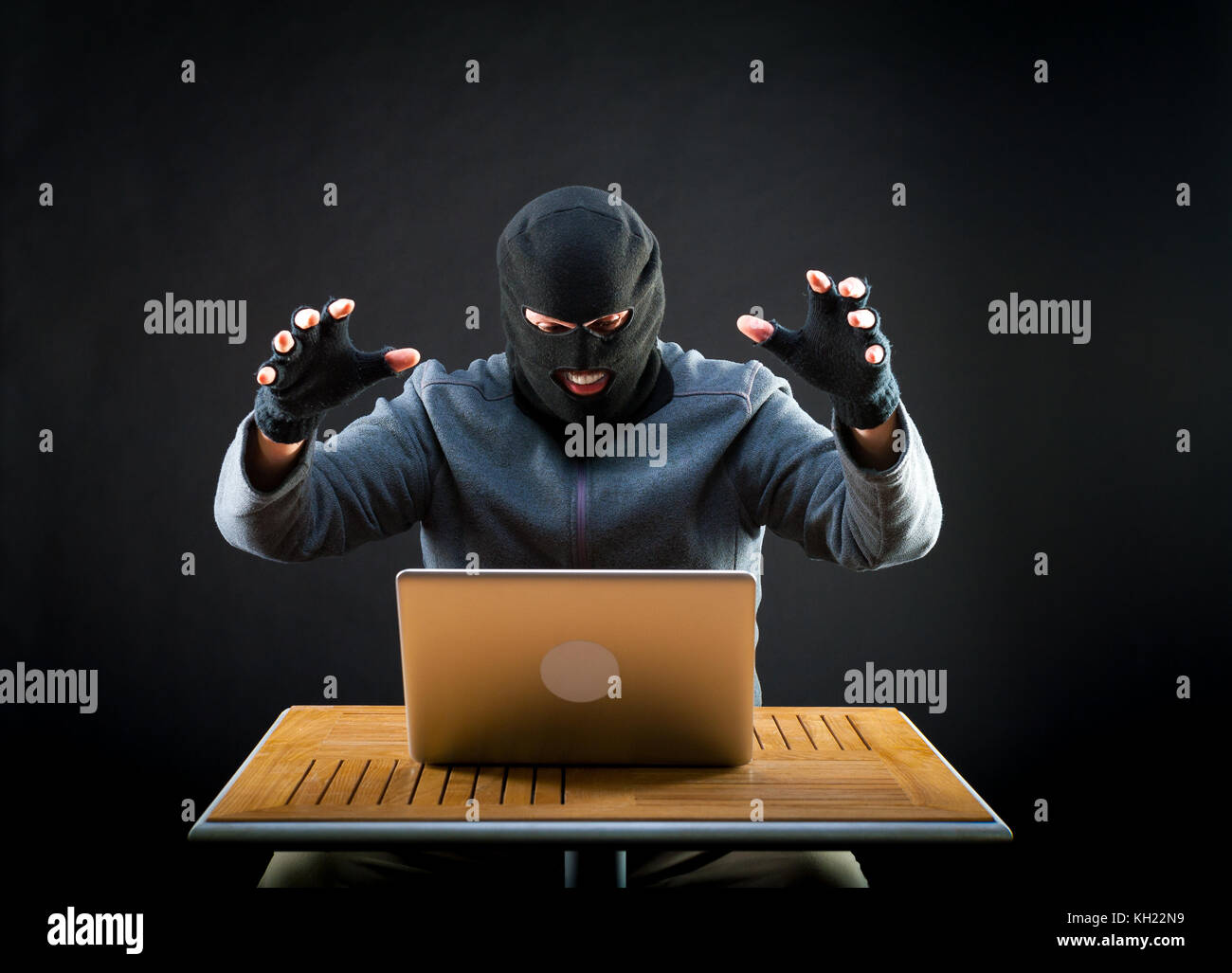 Hacker laptop computer stealing hi-res stock photography and images - Alamy