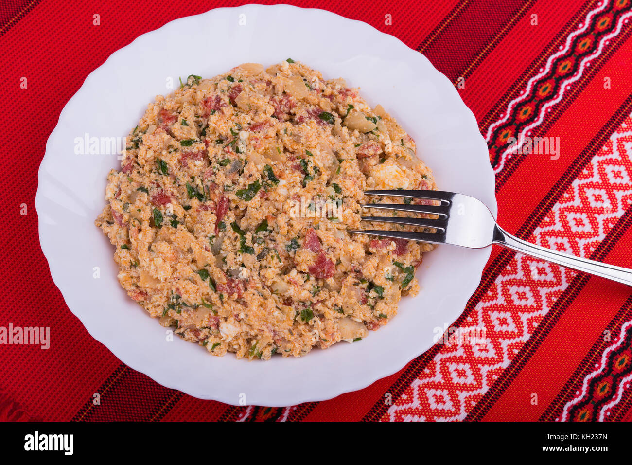 Traditional Bulgarian vegetable dish mish mash with mixed baked peppers ...