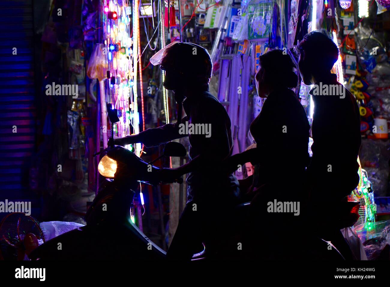 Waiting at a street stall, Phnom Penh Stock Photo - Alamy