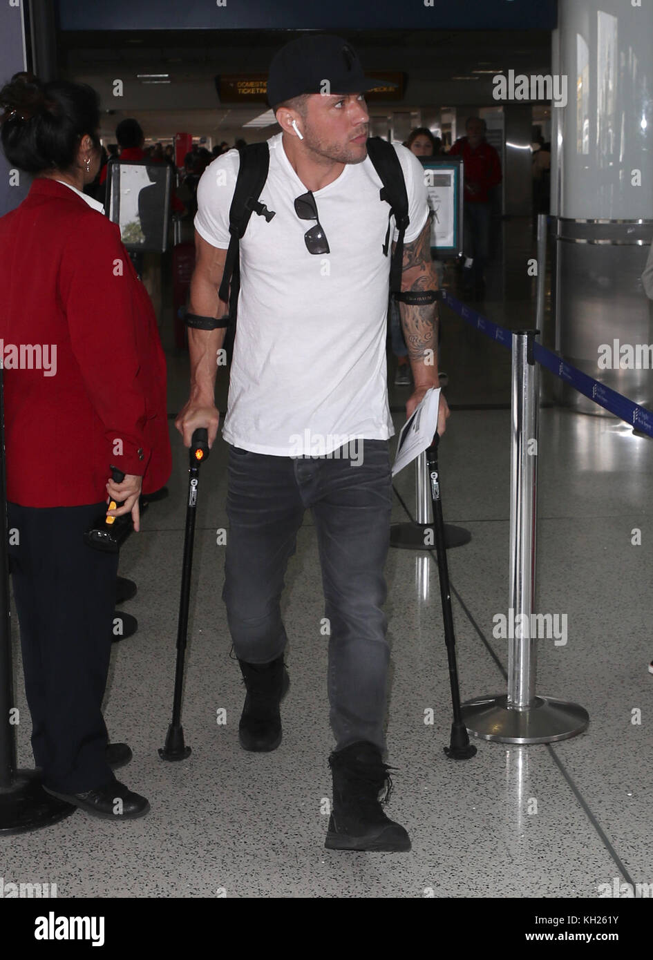 Ryan Phillippe arrives at Los Angeles International (LAX) on crutches ...
