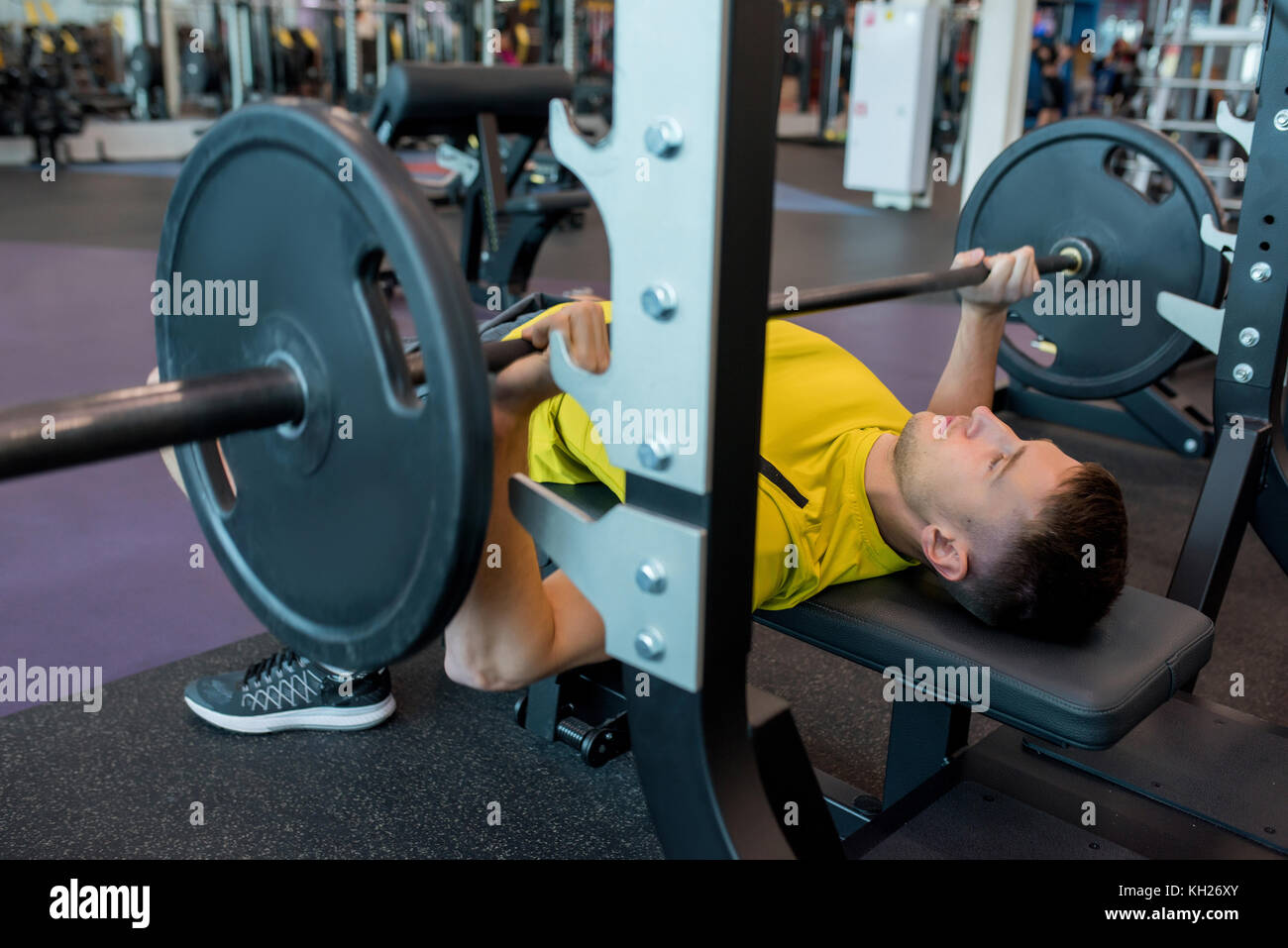 Young man lying on work bench hi-res stock photography and images - Alamy