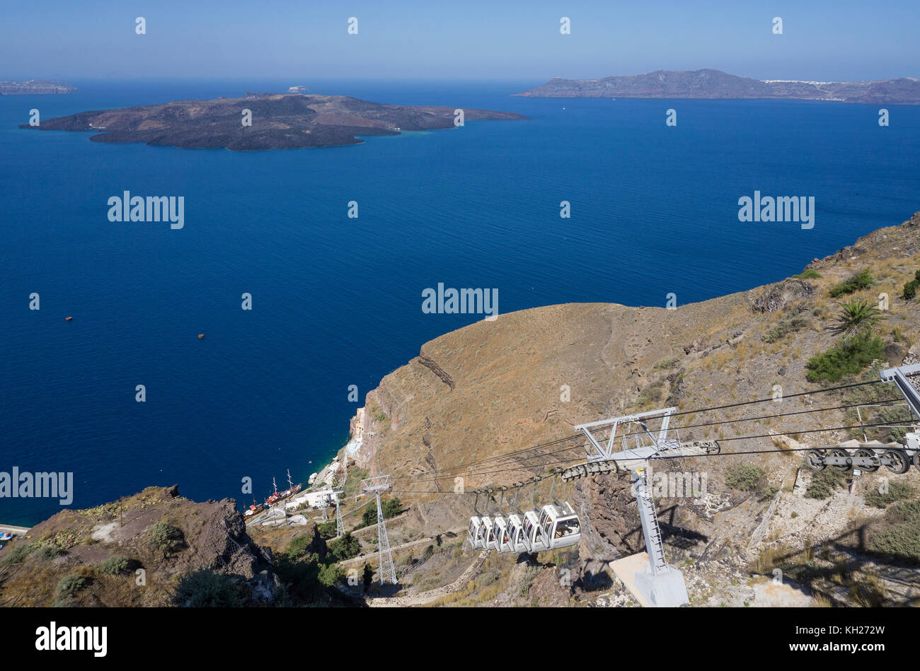Cable car from Thira to the old harbour, behind the volcanic island Nea ...