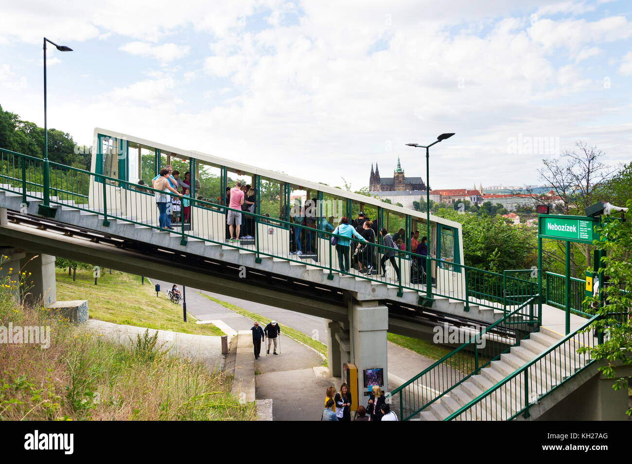 PRAGUE, CZECH REPUBLIC - JUNE 17: Tourists on funicular railway station ...