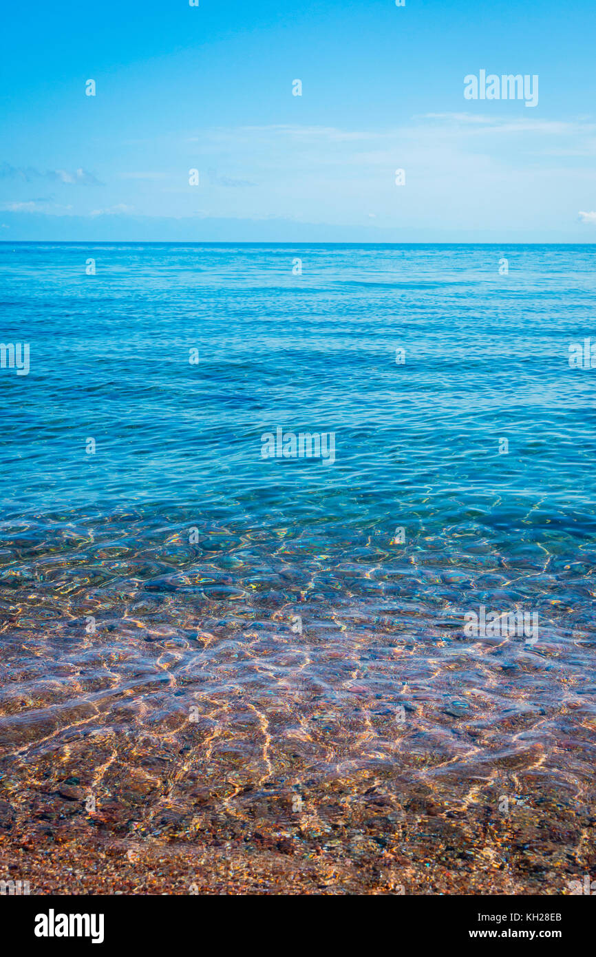 Blue and clear water of Karakol lake, Kyrgyzstan Stock Photo - Alamy