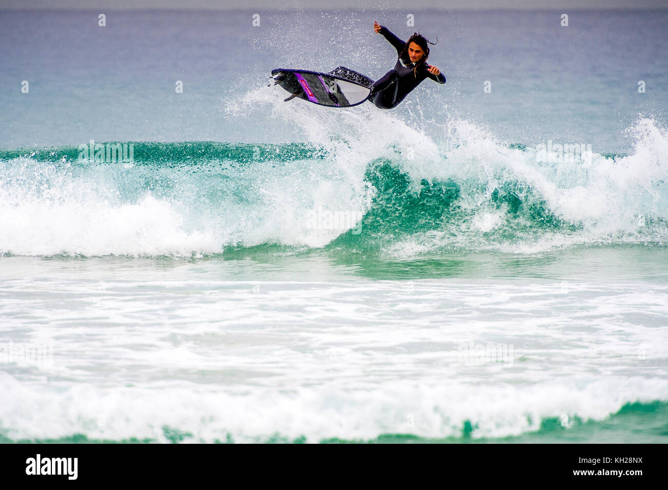 Epic moves by a surfer on a small surf day at Bondi Beach, Sydney, NSW ...