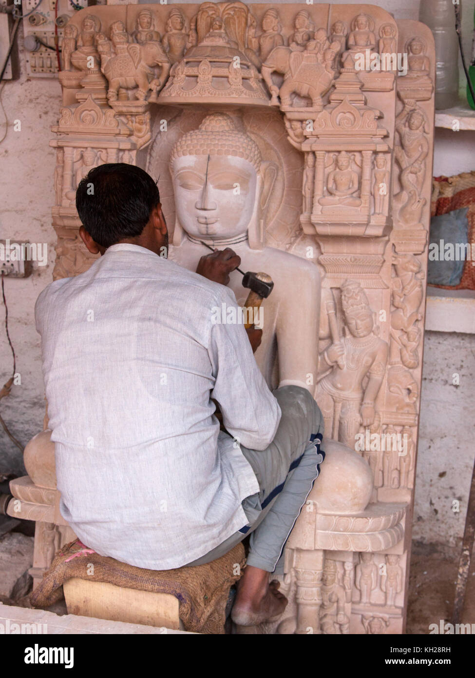 Stonemason carving replica millenium sculptures at Khajuraho, India ...