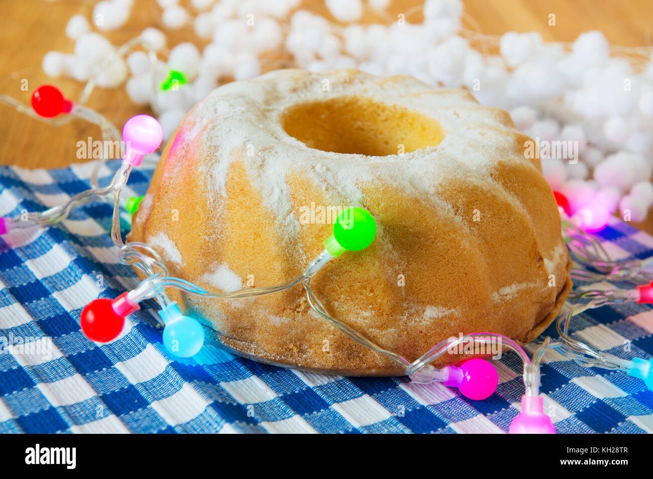 Christmas turban cake with colorful electric lights Stock Photo - Alamy