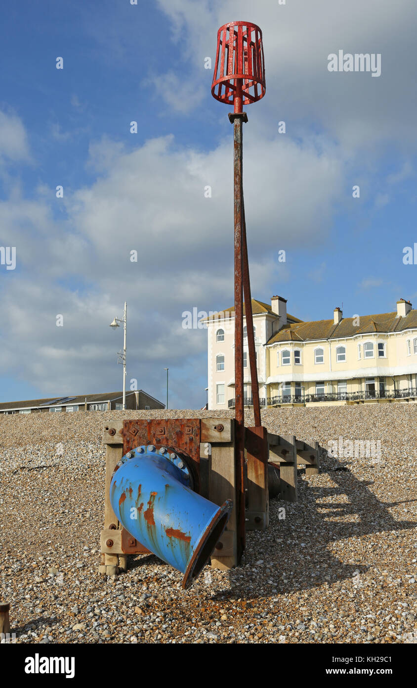 Drainage outfall pipe discharges water onto the beach at Bognor Reis ...