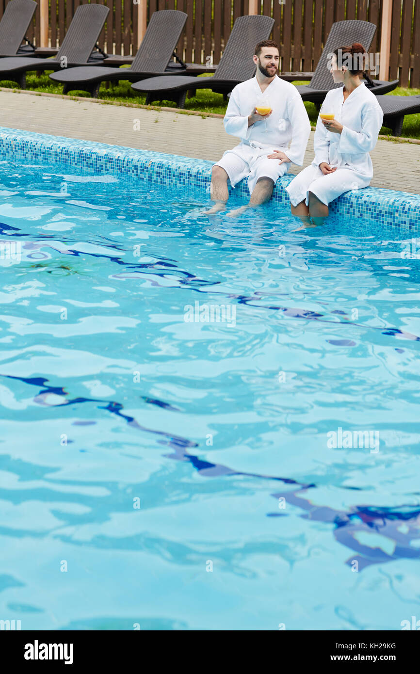 Young couple enjoying their vacation or honeymoon at spa resort Stock ...