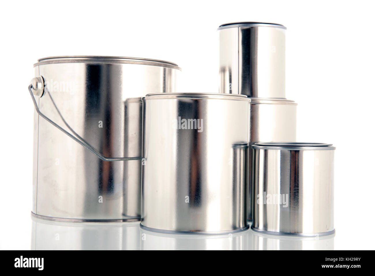 Metal tins for paint isolated over white background Stock Photo - Alamy