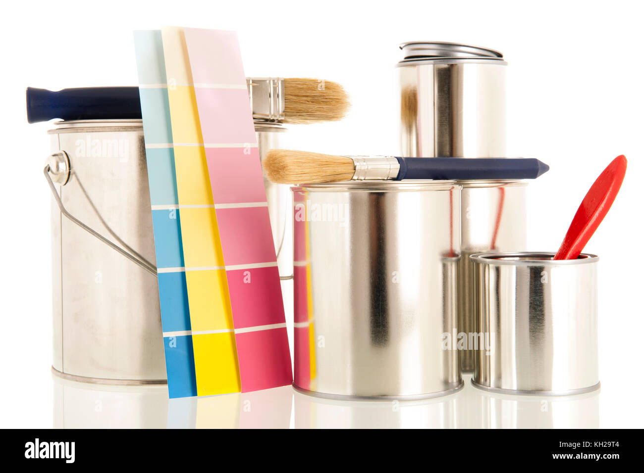 Metal tins for paint with blue brushes isolated over white background ...