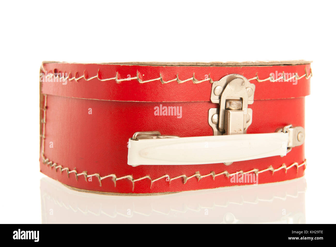 Little red toy suitcase isolated over white background Stock Photo - Alamy