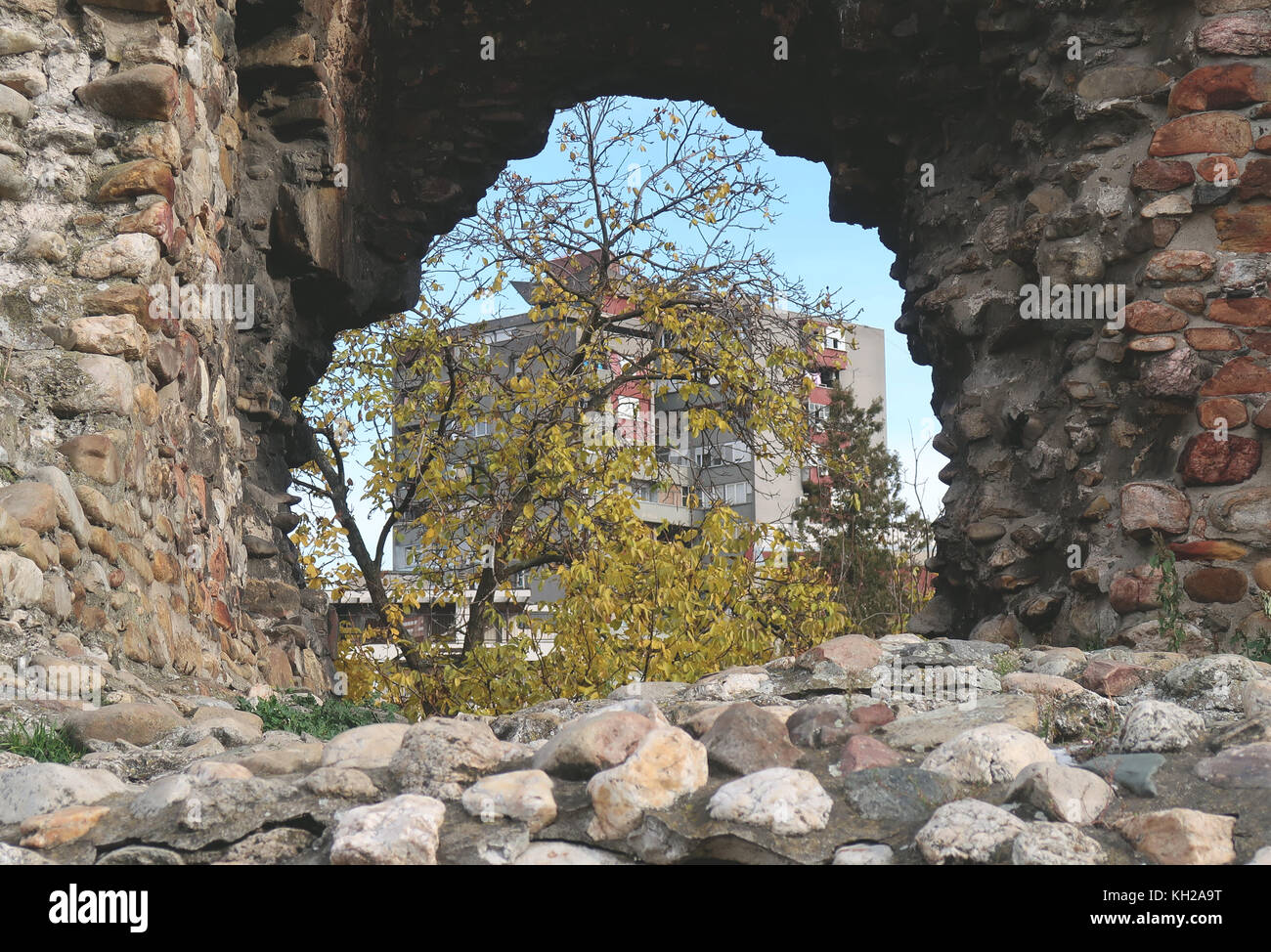 View through stone wall Stock Photo - Alamy