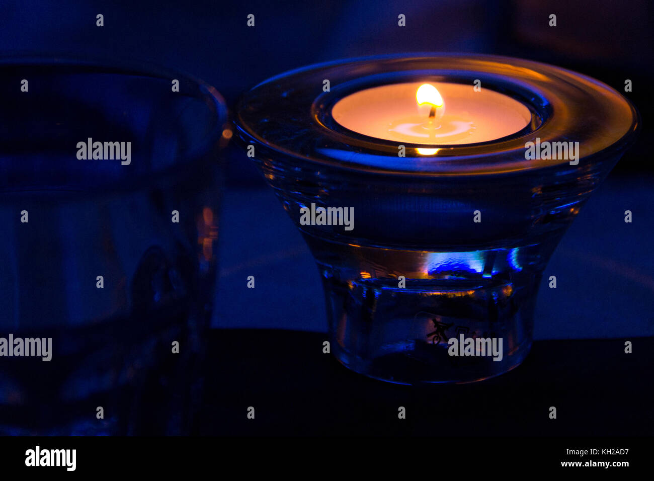 A candlelight in a neon illumination Stock Photo - Alamy