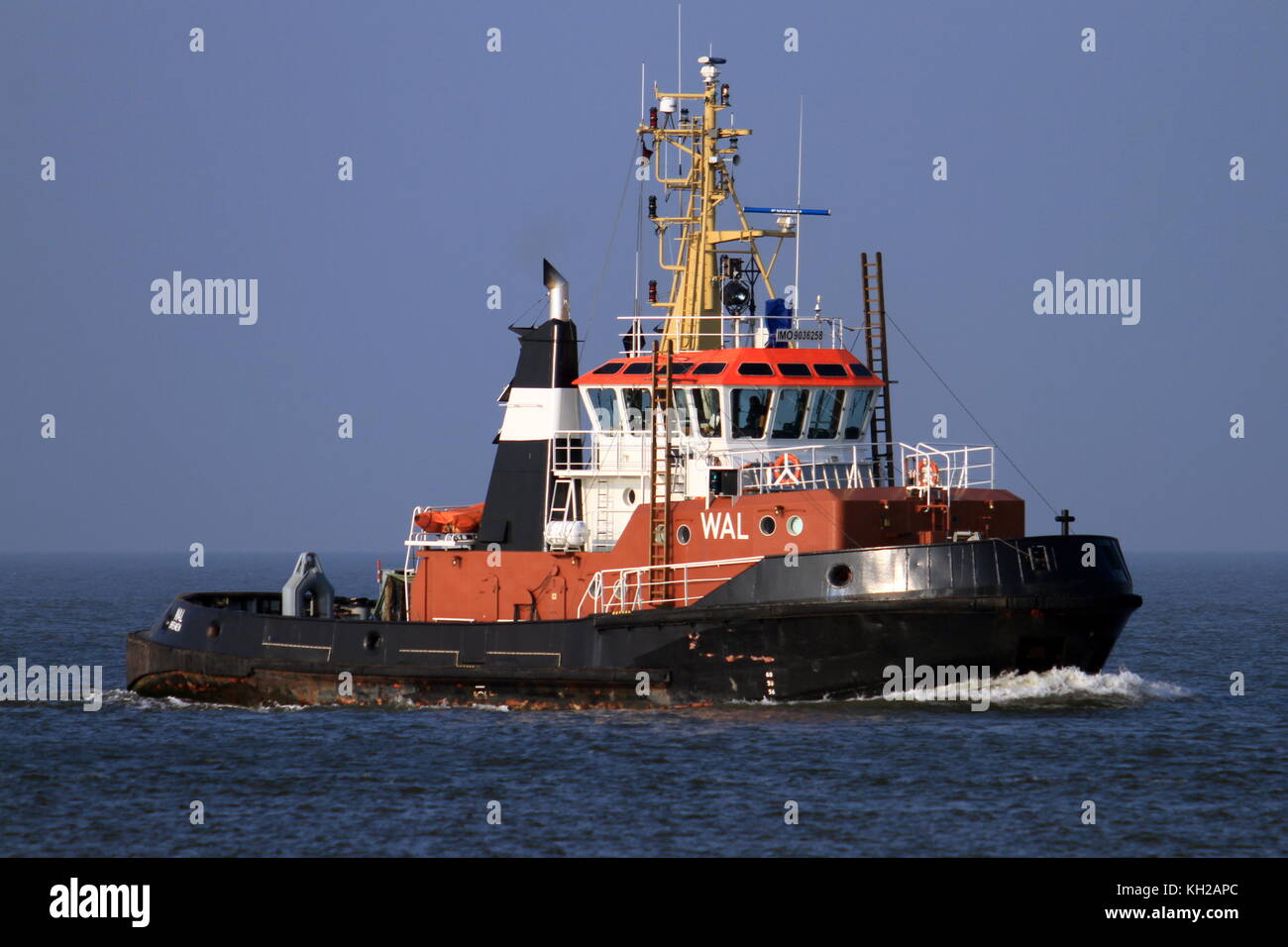 The tug boat Wal passes on October 4, 2015 Cuxhaven on the Elbe river ...