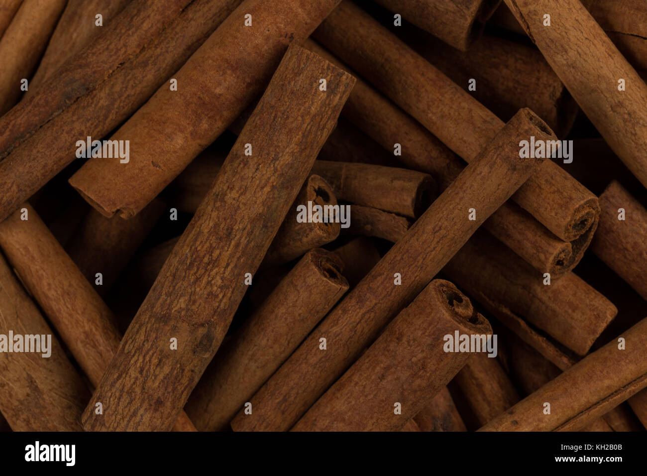 Cinnamon sticks spice closeup background. Texture of cinnamon sticks ...