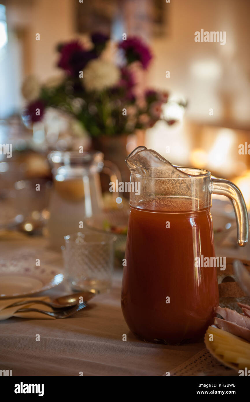 Decorated table with jug of juice Stock Photo - Alamy