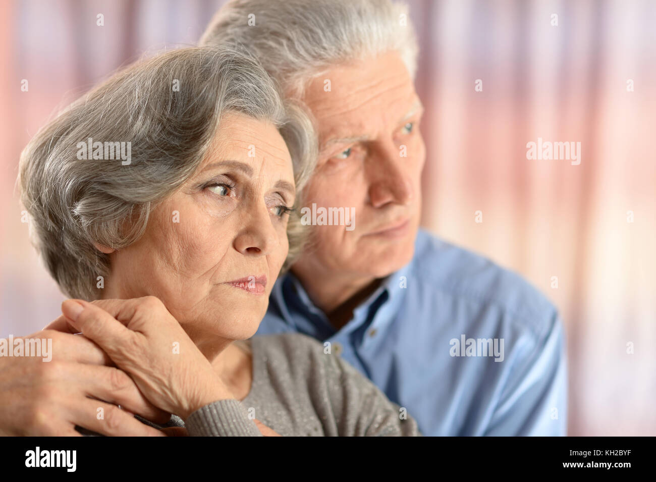 Sad senior couple Stock Photo - Alamy